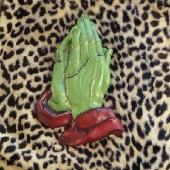 The Praying Hands of Saint Frankenstein by erin tinney